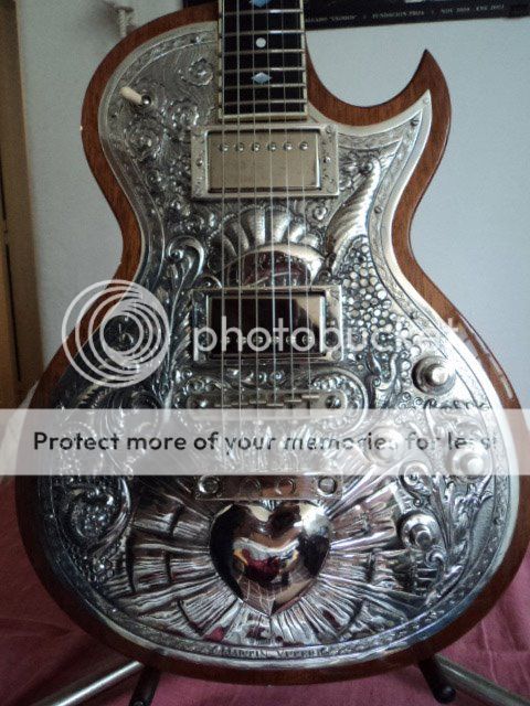 new guitar made out of silver | The Gear Page
